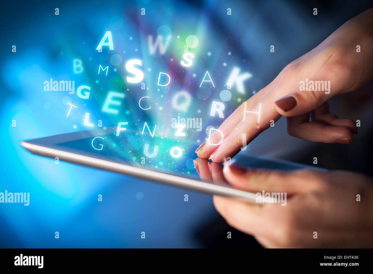Finger pointing on tablet pc, letters concept Stock Photo - Alamy
