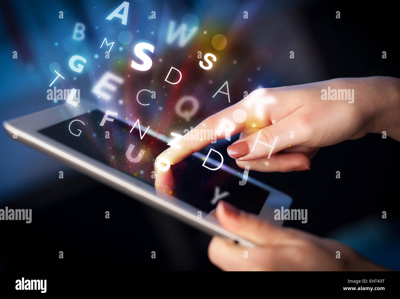 Finger pointing on tablet pc, letters concept Stock Photo - Alamy