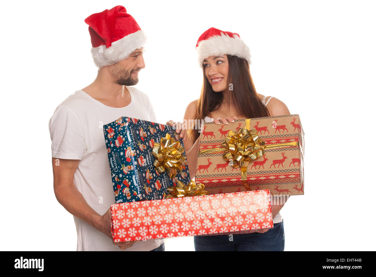 Happy festive couple gifts Cut Out Stock Images & Pictures - Alamy