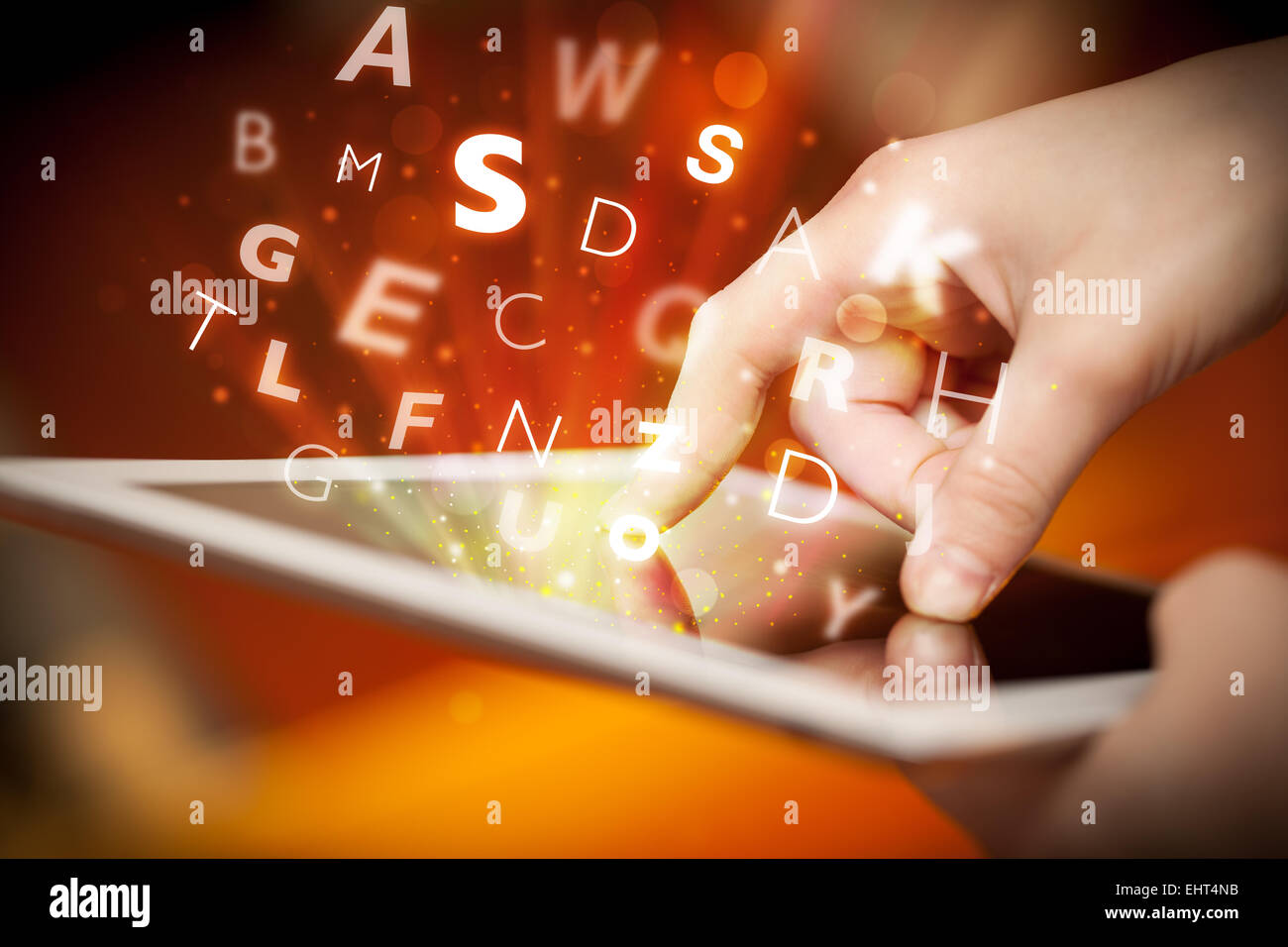 Finger pointing on tablet pc, letters concept Stock Photo - Alamy