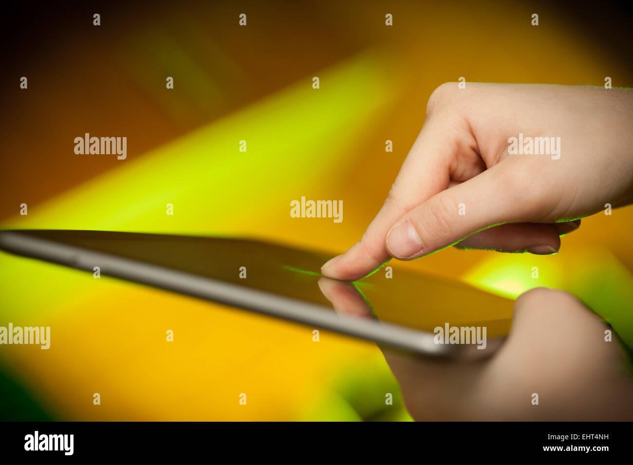 Finger pointing on tablet pc with empty space Stock Photo - Alamy