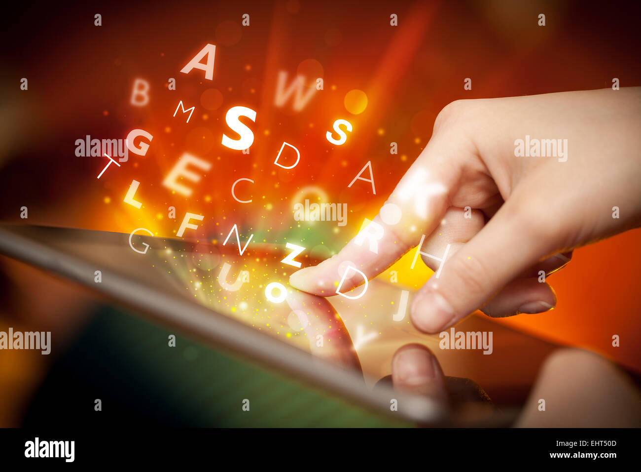 Finger pointing on tablet pc, letters concept Stock Photo - Alamy