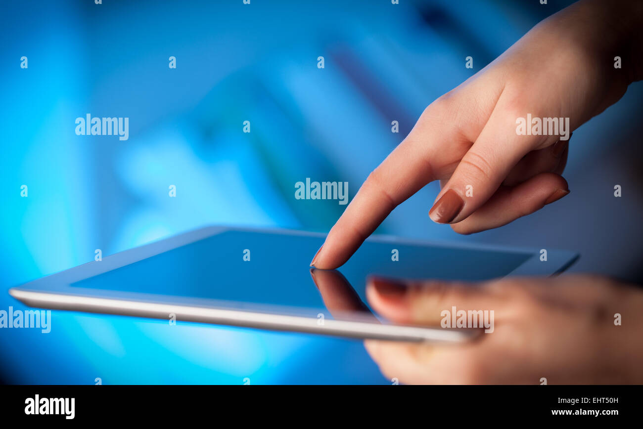 Finger pointing on tablet pc with empty space Stock Photo - Alamy