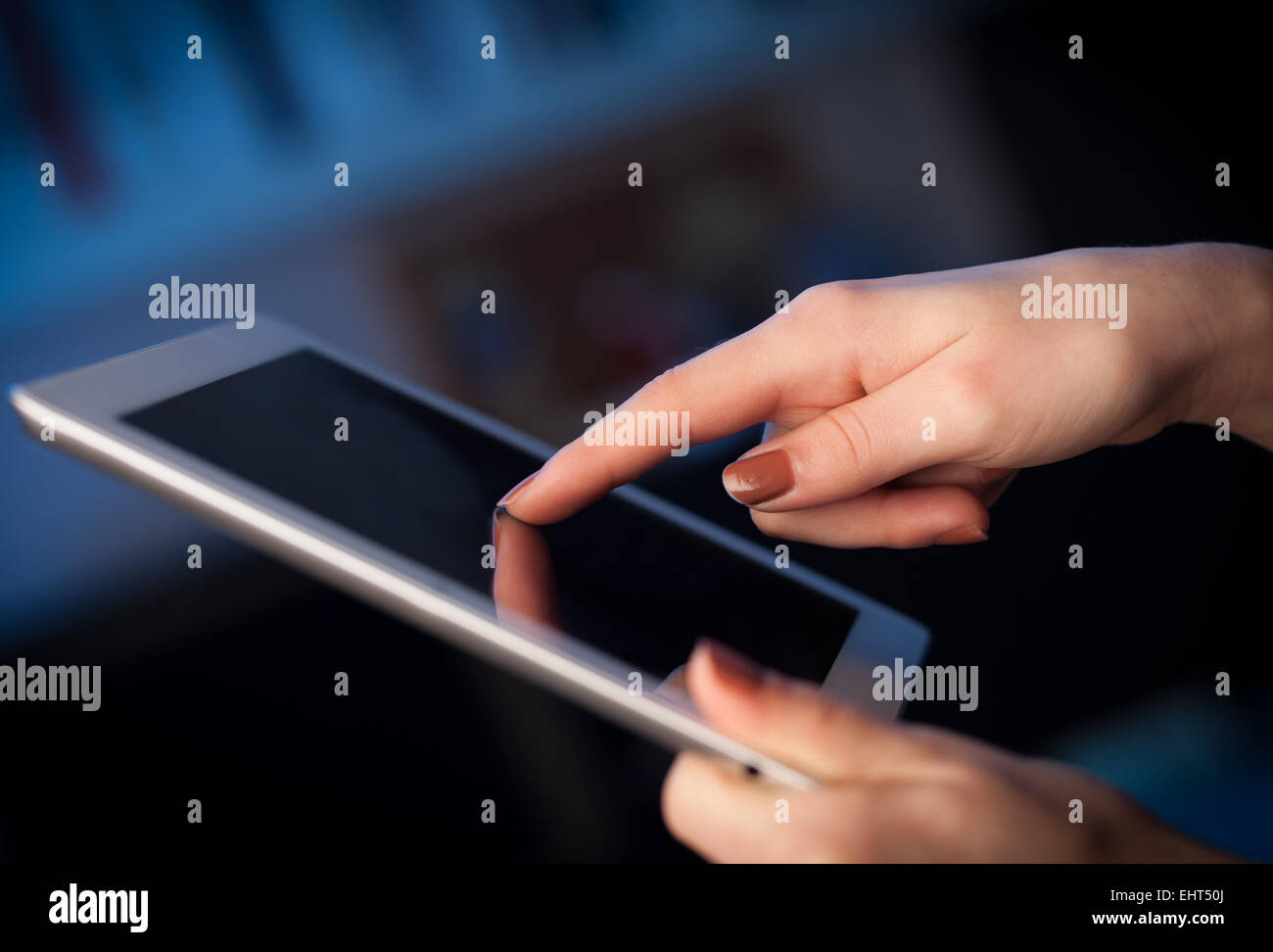 Finger pointing on tablet pc with empty space Stock Photo - Alamy