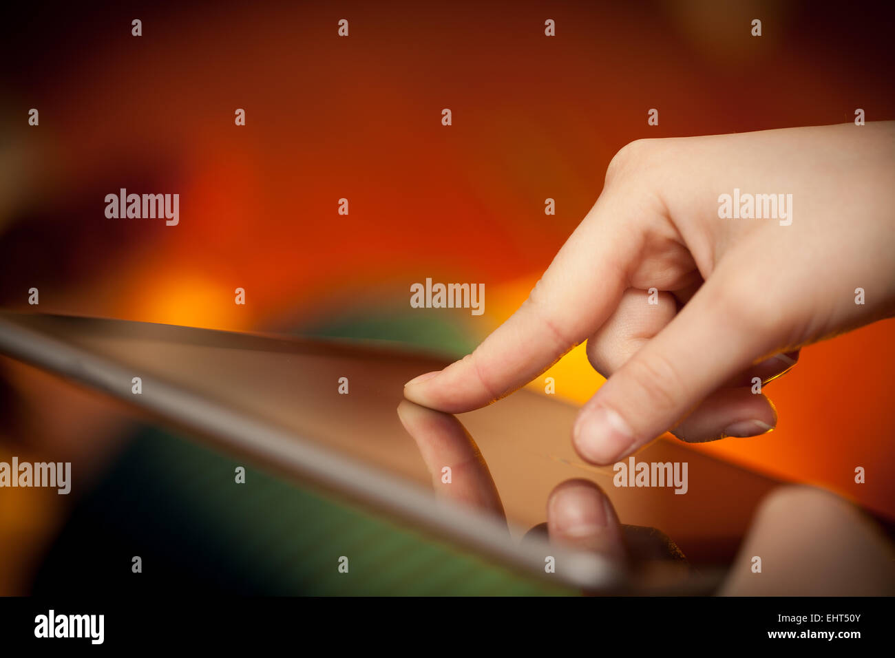 Finger pointing on tablet pc with empty space Stock Photo - Alamy