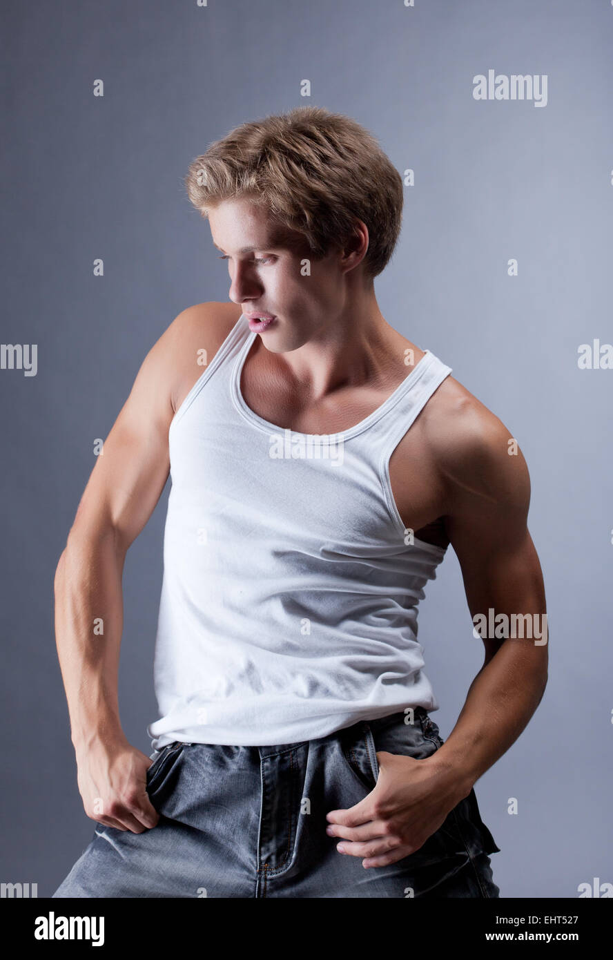 Portrait of muscular young hip hop dancer Stock Photo - Alamy