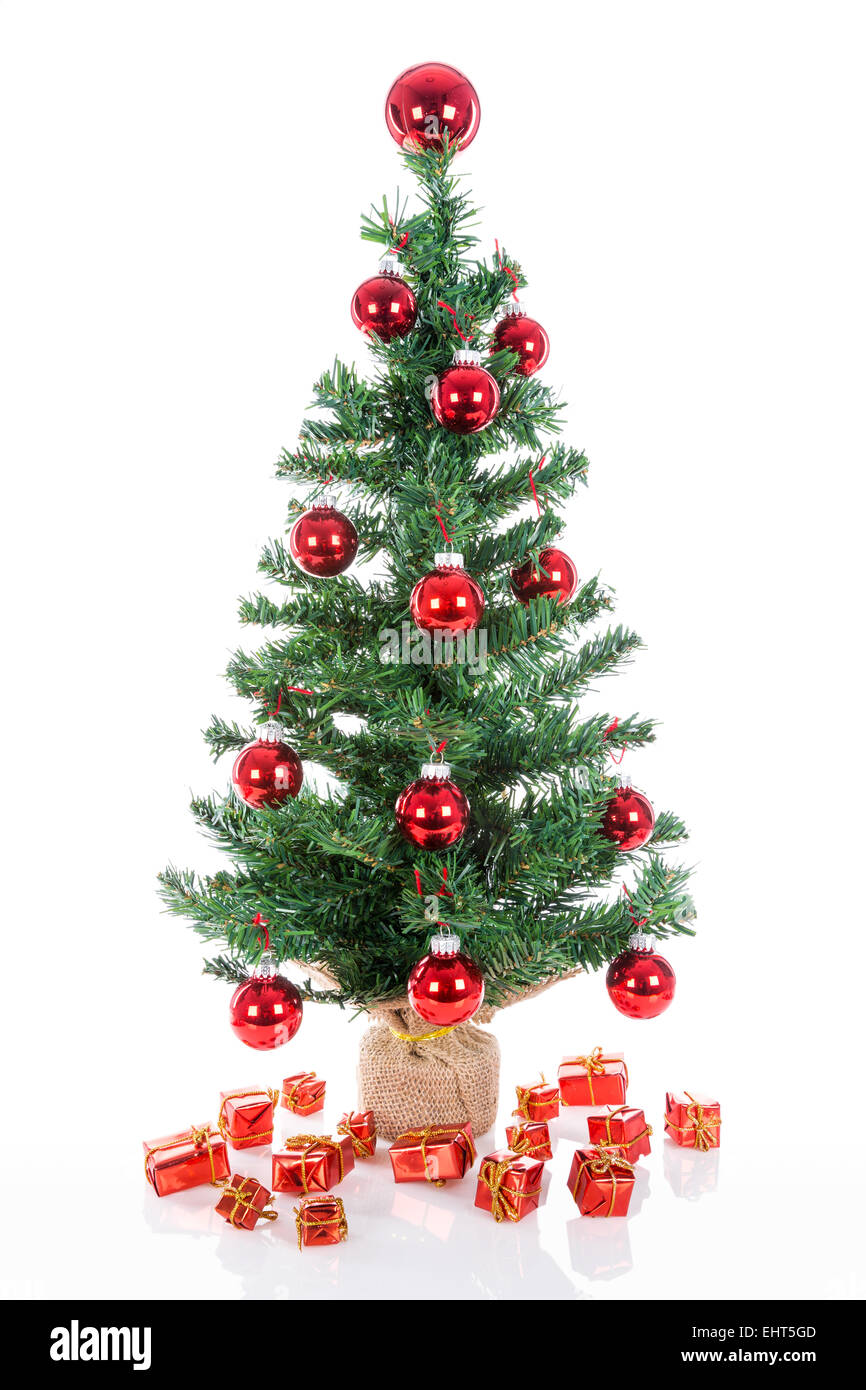 Christmas tree with red balls and gifts isolated over white Stock Photo ...