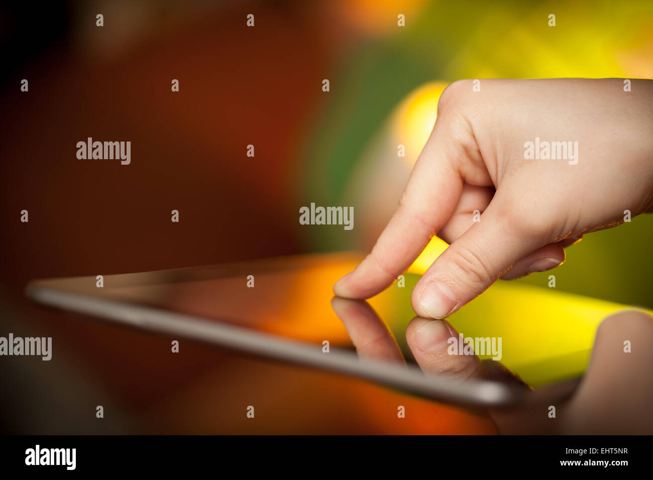 Finger pointing on tablet pc with empty space Stock Photo - Alamy