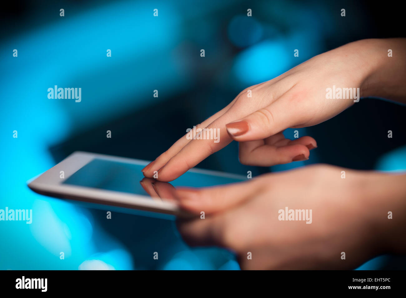 Finger pointing on tablet pc with empty space Stock Photo - Alamy