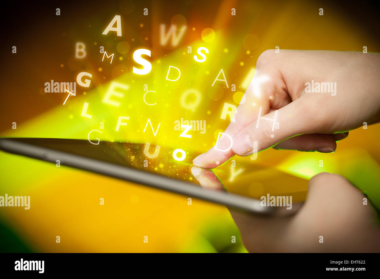 Finger pointing on tablet pc, letters concept Stock Photo - Alamy