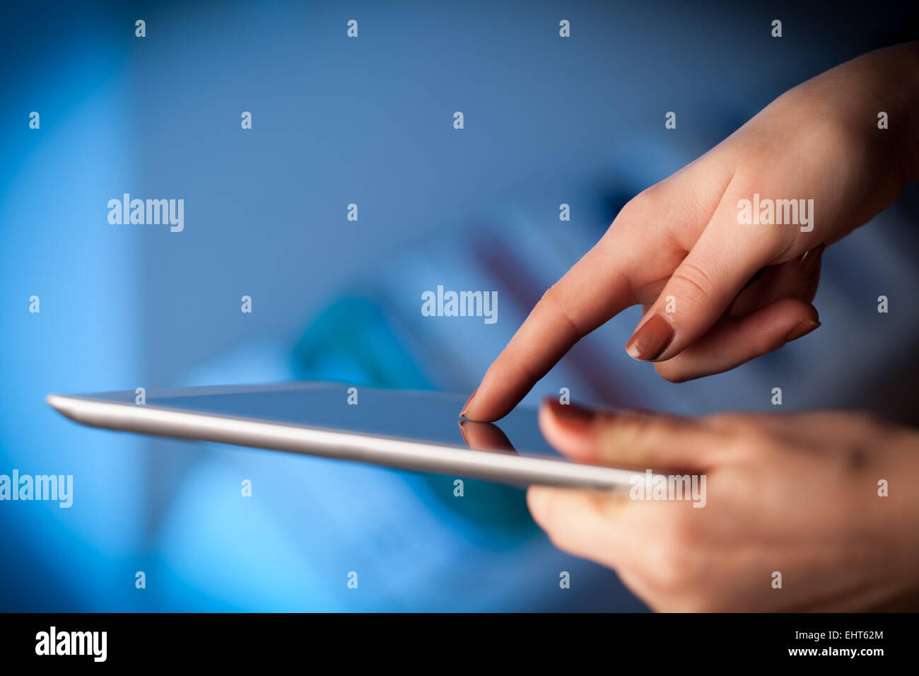 Finger pointing on tablet pc with empty space Stock Photo - Alamy