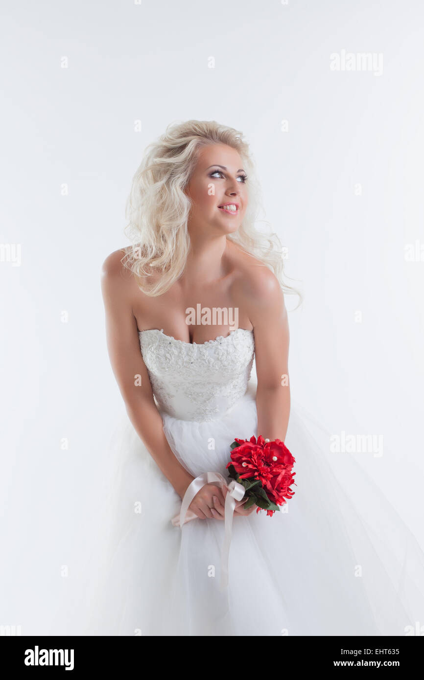 Attractive model posing in wedding attire Stock Photo - Alamy