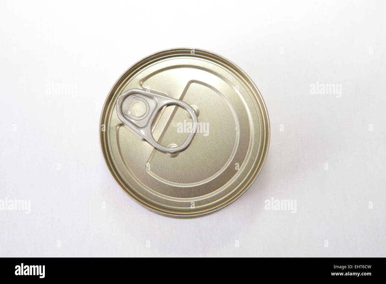 Closed Circular tin can isolated over white background. Selective focus ...