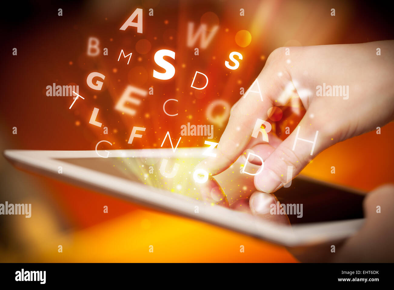 Finger pointing on tablet pc, letters concept Stock Photo - Alamy
