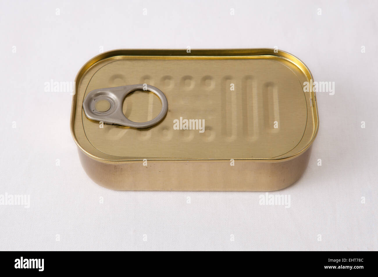 Closed rectangular tin can isolated over white background. Selective ...