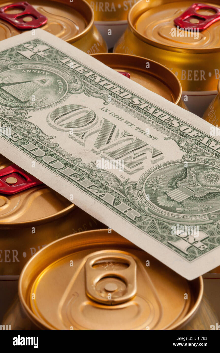 Cans of beer and US dollar banknote Stock Photo - Alamy