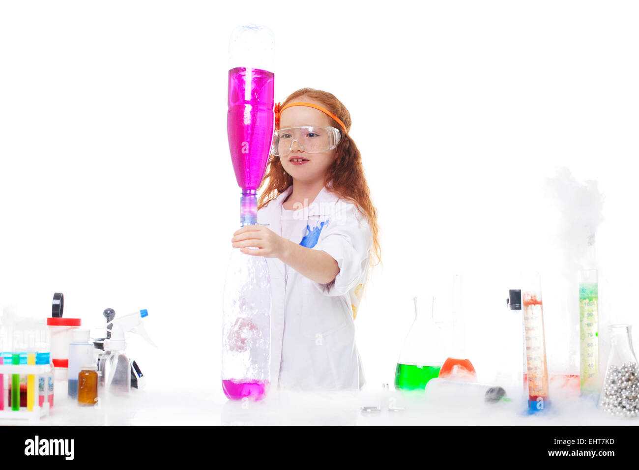 Charming red-haired girl posing as scientist Stock Photo - Alamy
