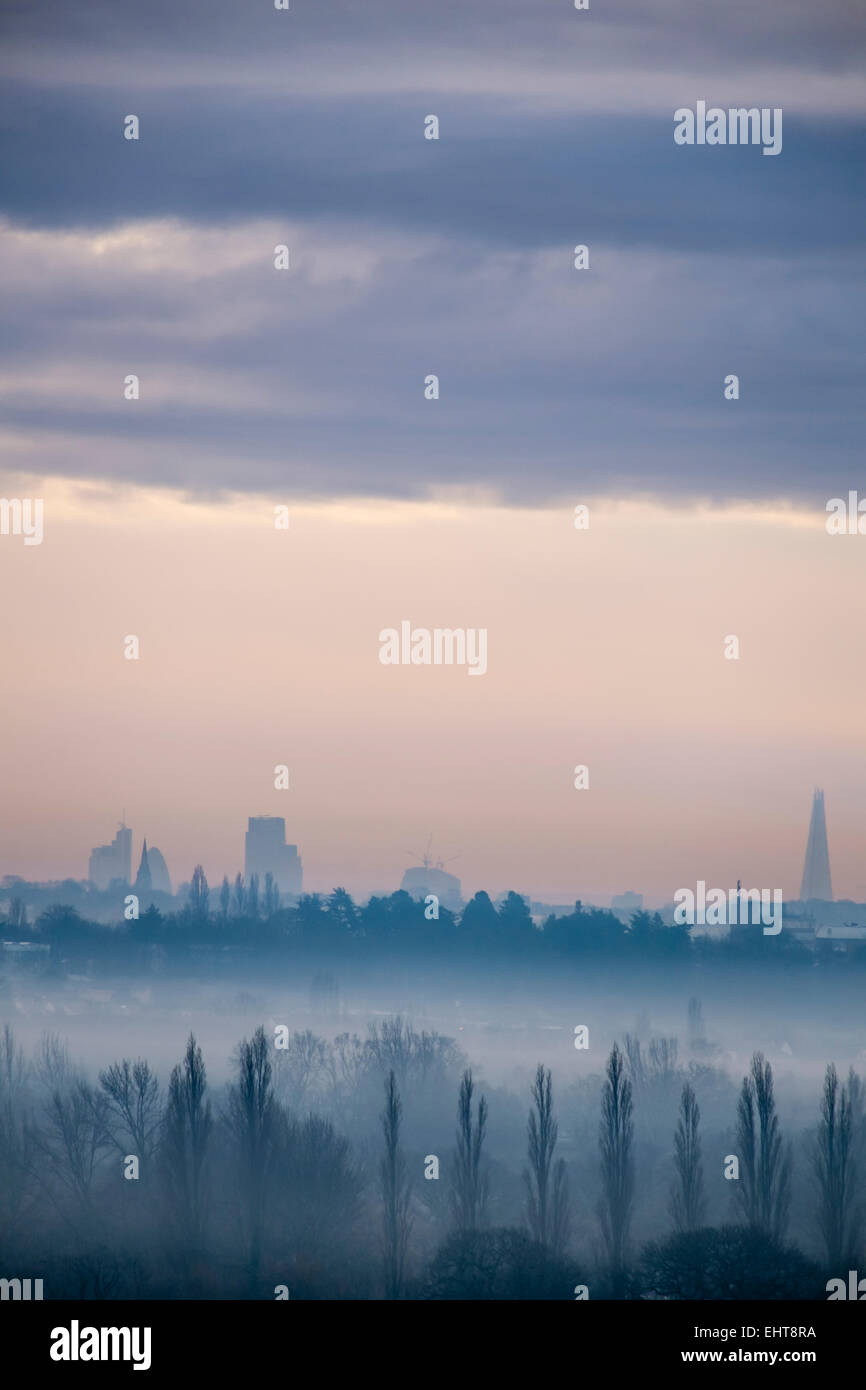 City of London in distance on misty morning Stock Photo - Alamy