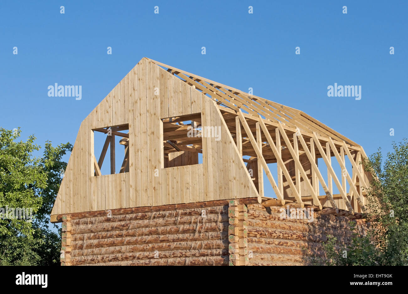New wooden house construction Stock Photo - Alamy