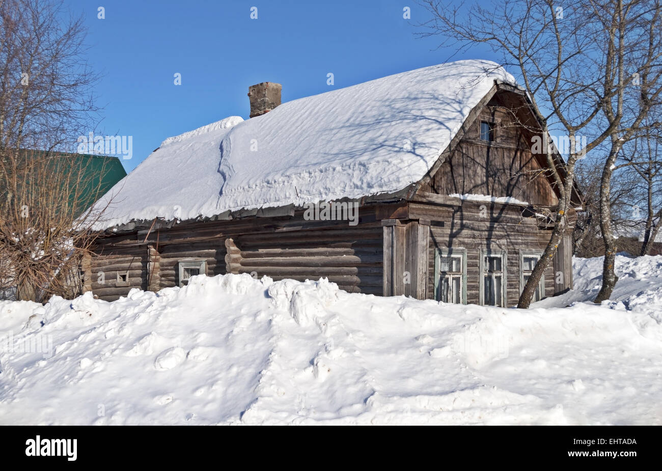 Old log hut covered with snow Stock Photo - Alamy