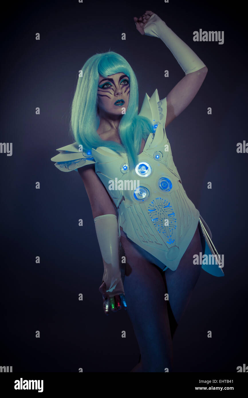 Droid woman, future robot with white armor dress Stock Photo - Alamy