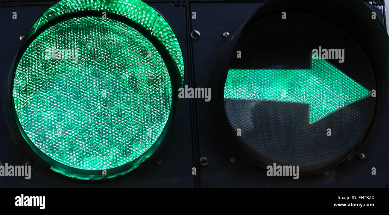 A green traffic light with left arrow Stock Photo - Alamy