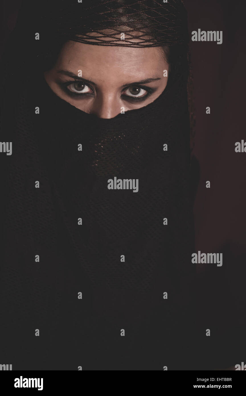 India, woman in traditional Islamic veil, burka, beautiful and deep ...