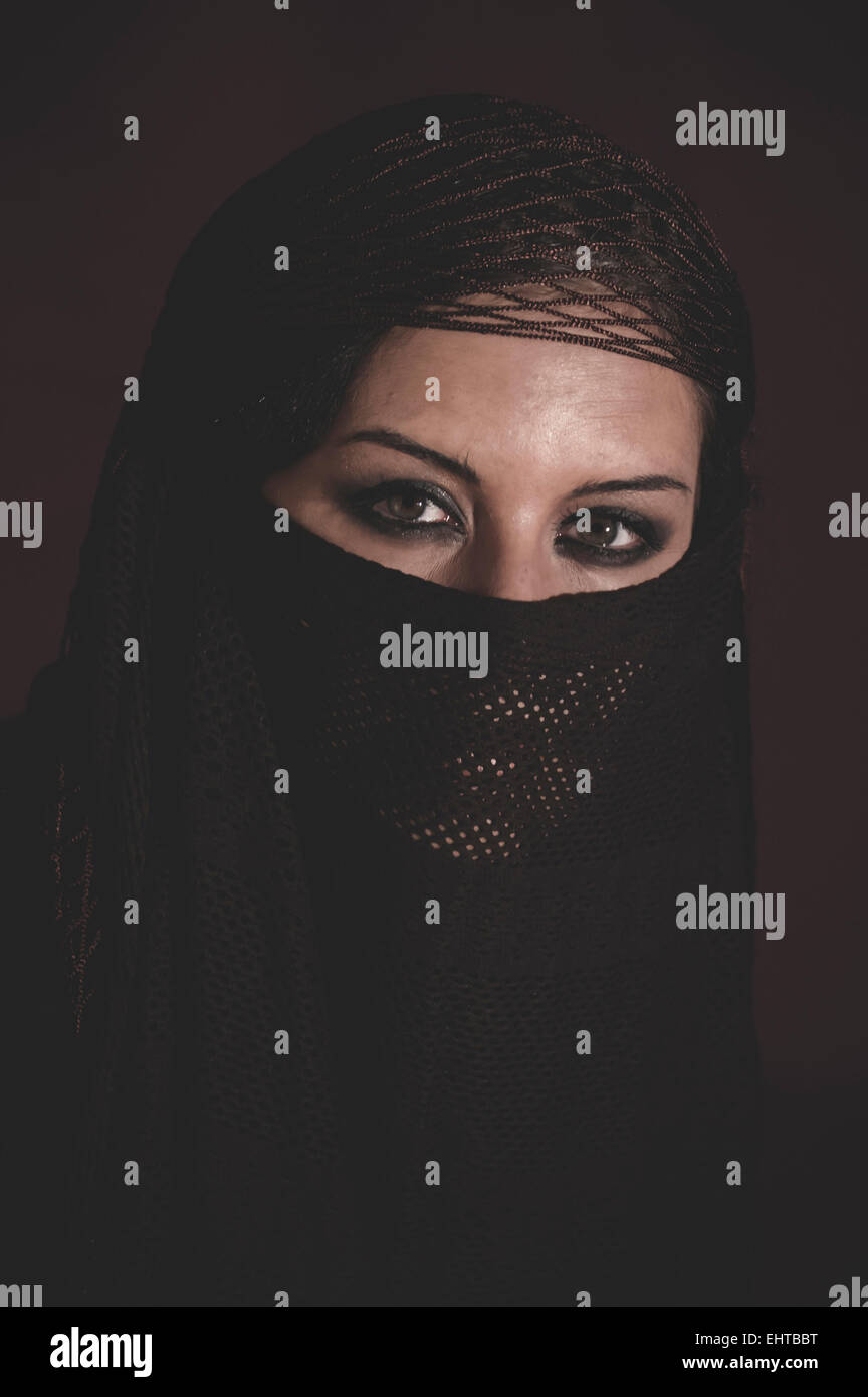 India, woman in traditional Islamic veil, burka, beautiful and deep ...