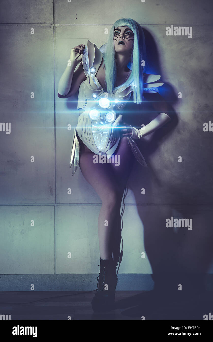 future woman with white suit and technological Stock Photo - Alamy