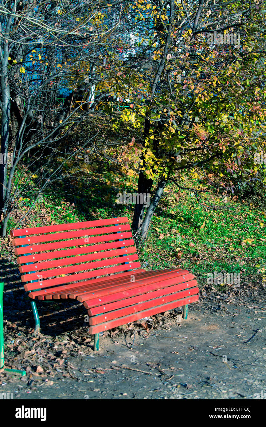 Bench in autumn park, Moscow Stock Photo - Alamy