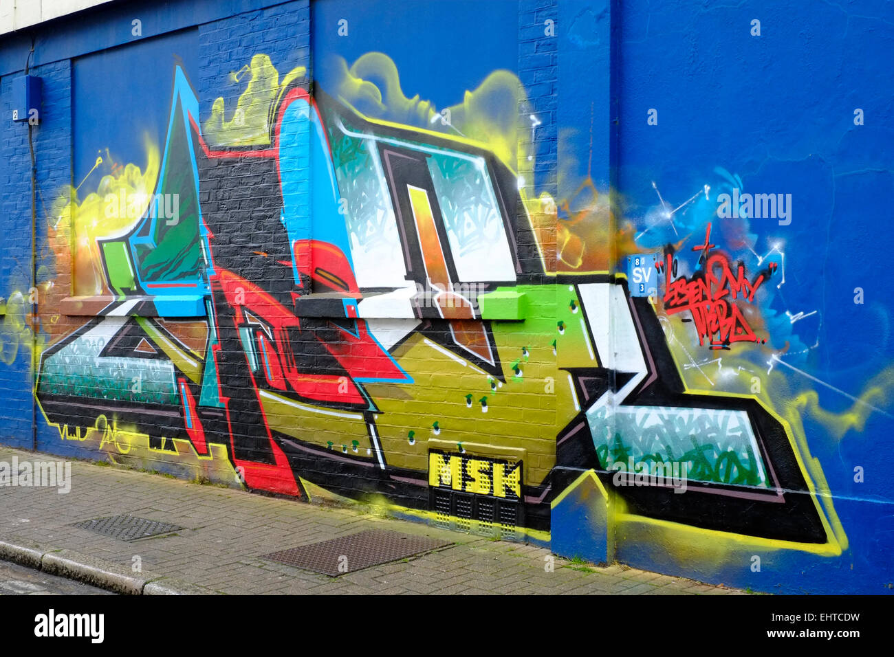 modern street art graffiti spray painted onto a wall Stock Photo - Alamy