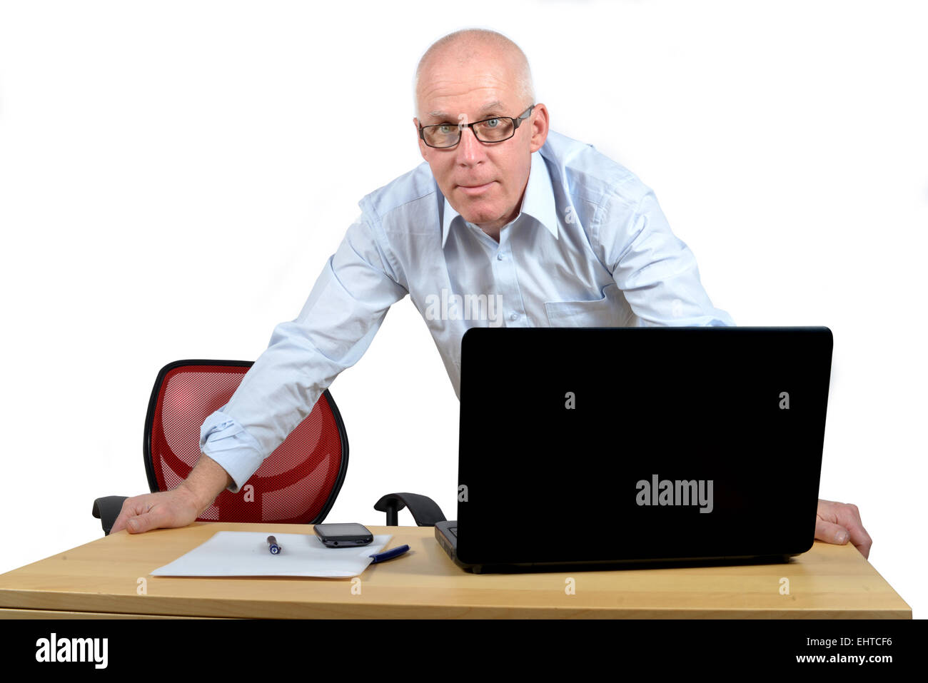 Standing behind the desk hi-res stock photography and images - Alamy