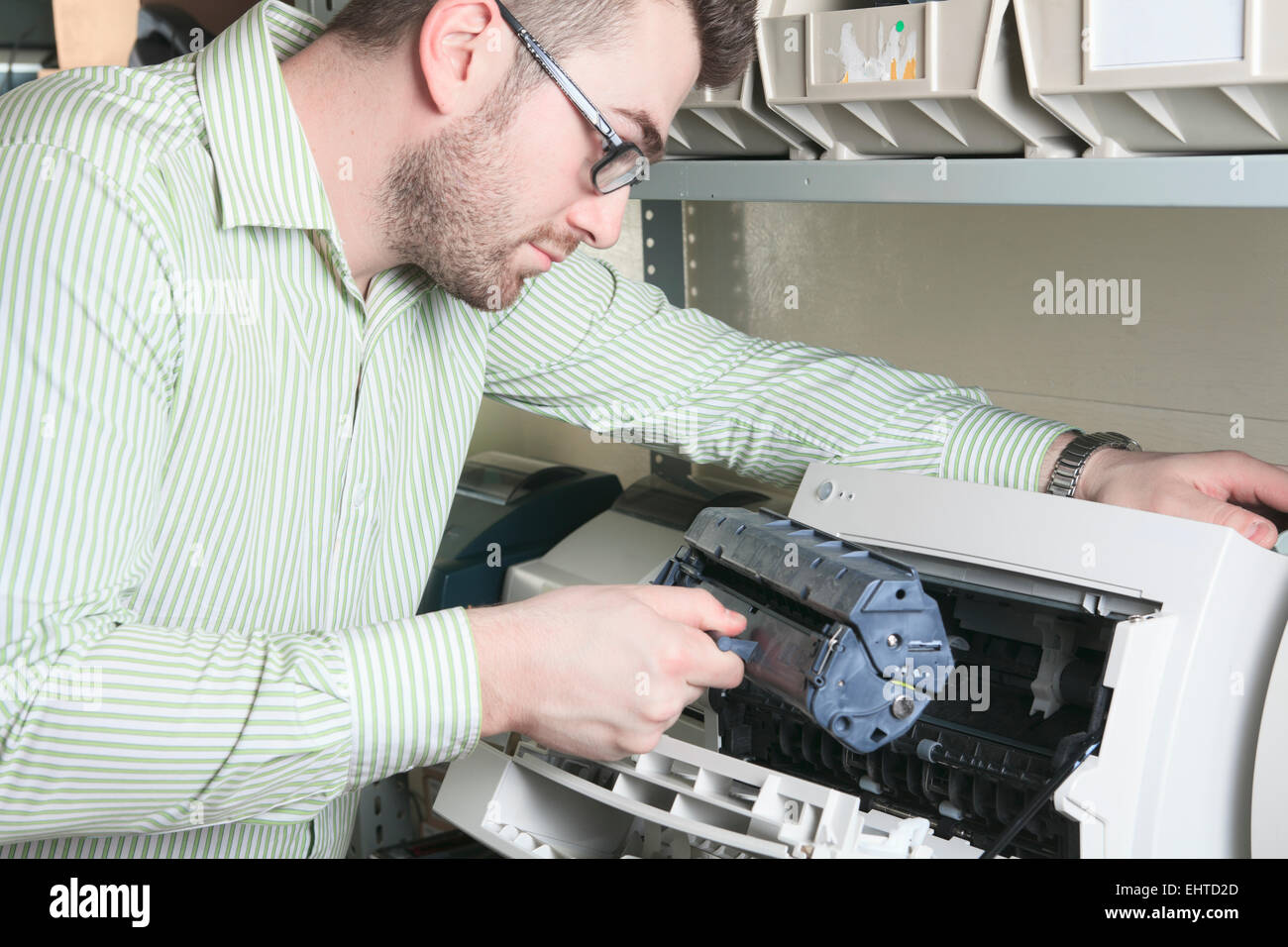 A happy worker technician at work with computer Stock Photo - Alamy