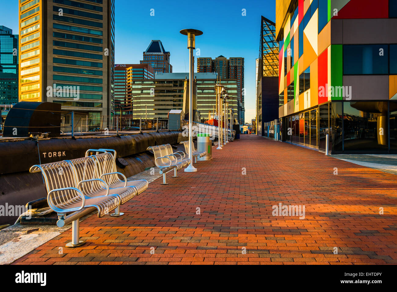 Benches on the Waterfront Promenade and the colorful National Aquarium ...