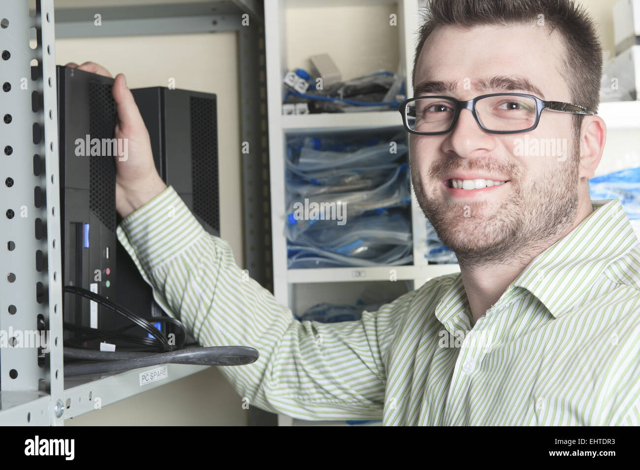 worker technician at work with computer Stock Photo - Alamy