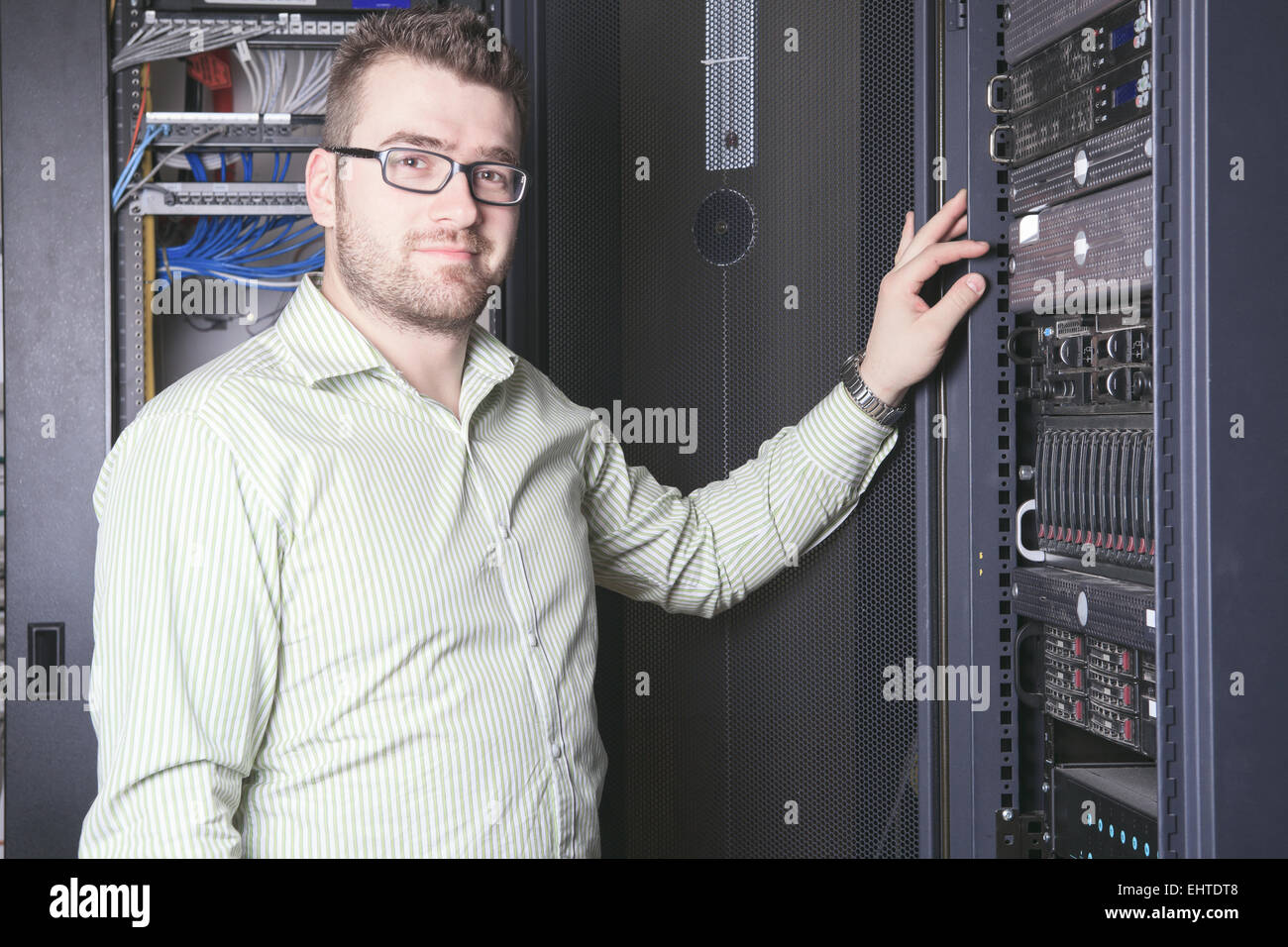 Engineer in server room using hi-res stock photography and images - Alamy