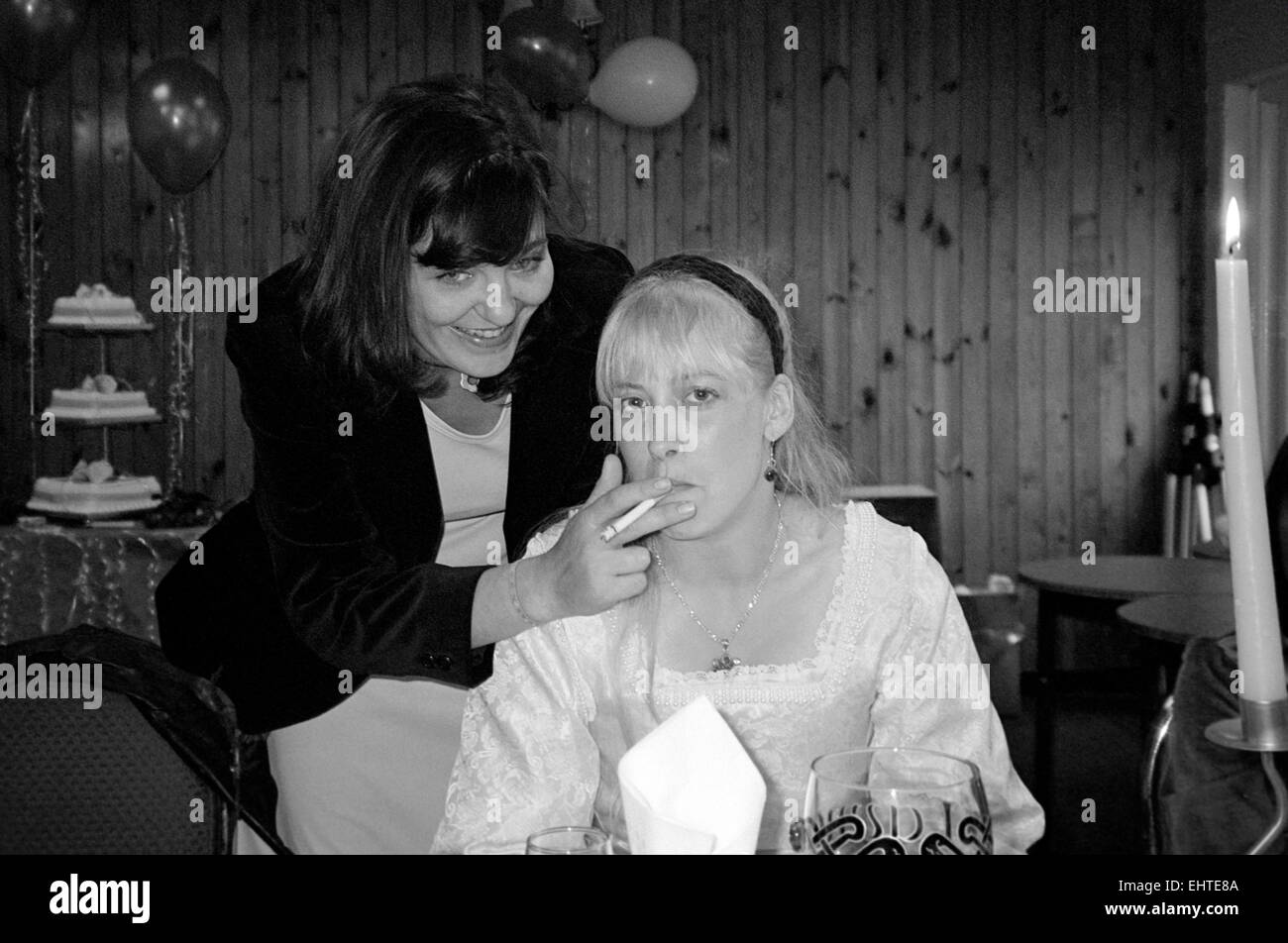 Bride smoking cigarette wedding hi-res stock photography and images - Alamy