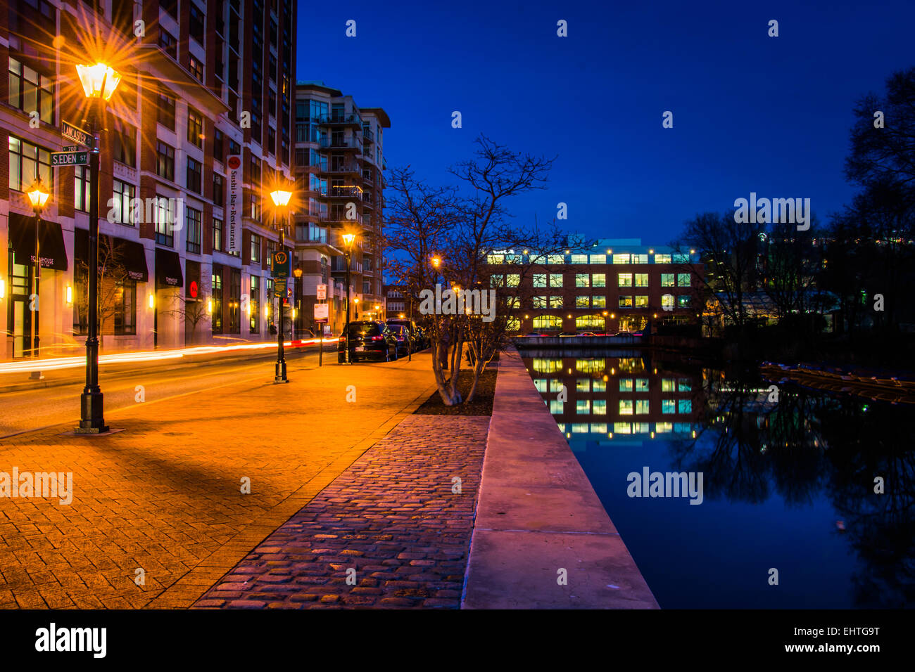 Canal along a street at night in Baltimore, Maryland Stock Photo - Alamy