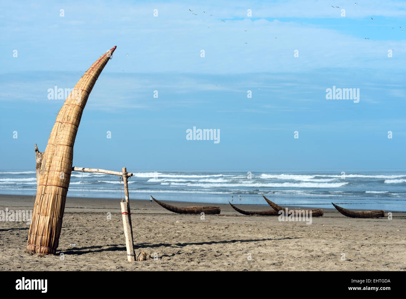 Traditional Peruvian small Reed Boats Stock Photo - Alamy