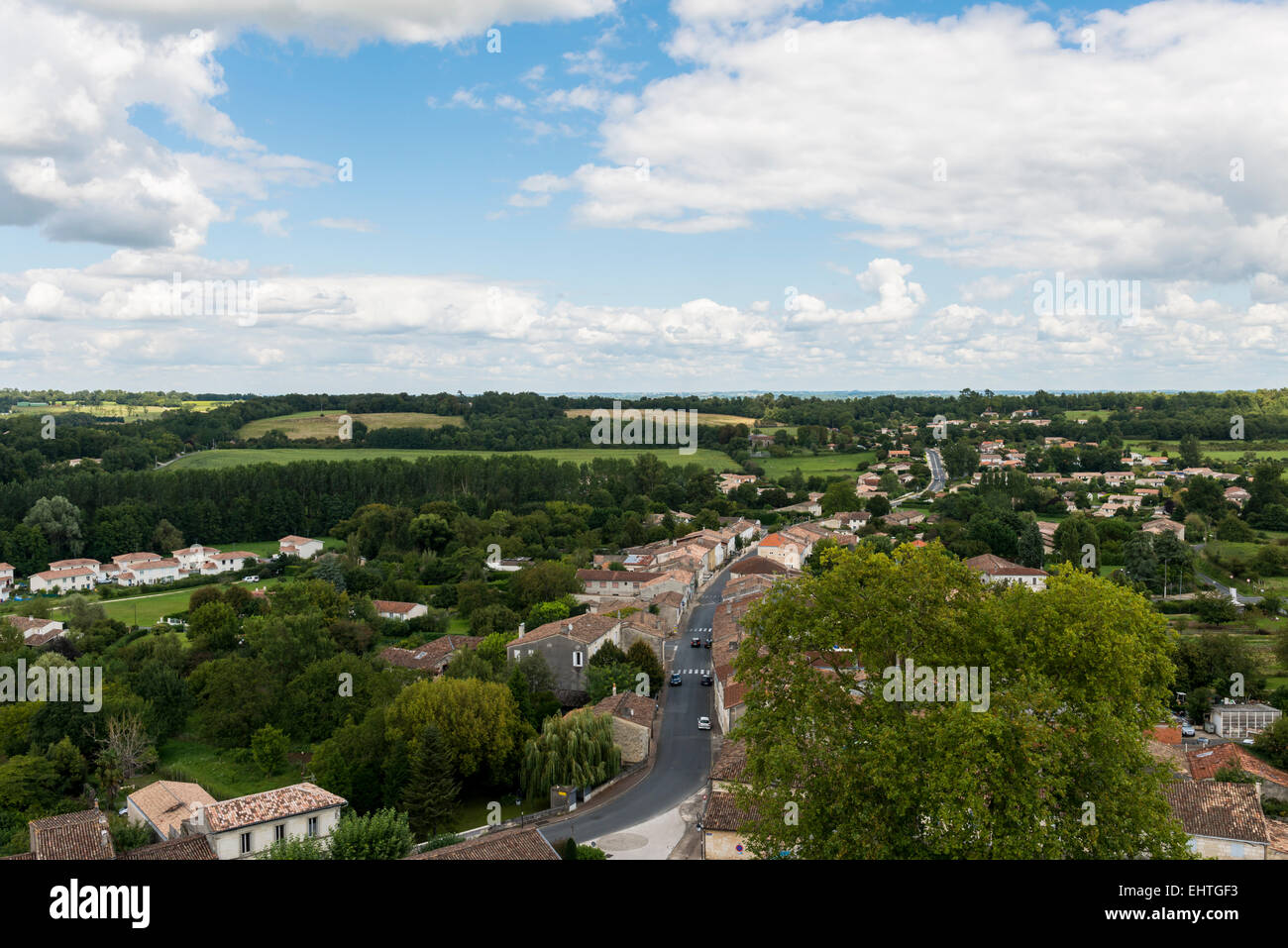 View on Sauve in France with hills, houses and a blue sky with white ...