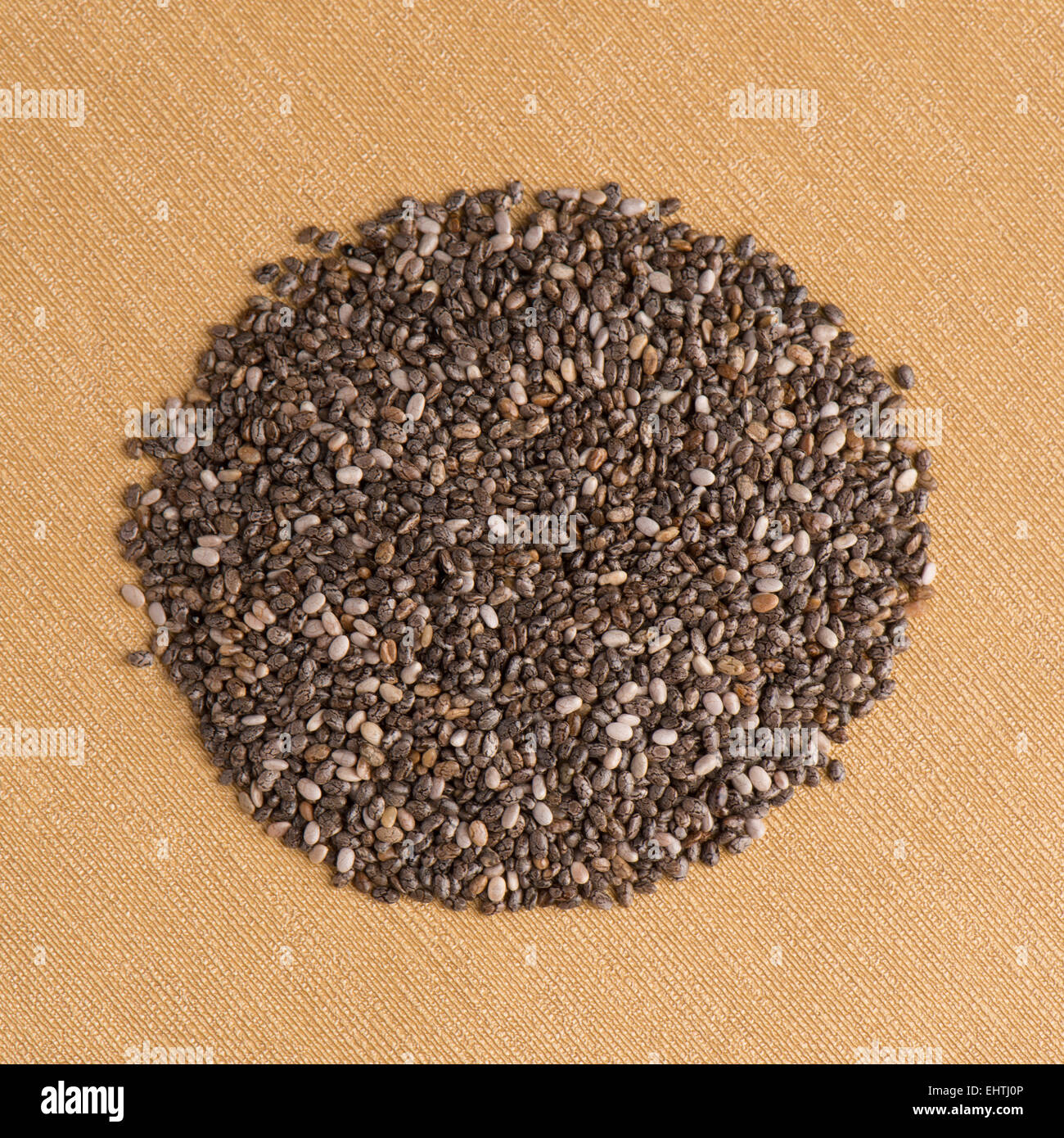 Top view of chia seeds against brown vinyl background Stock Photo - Alamy