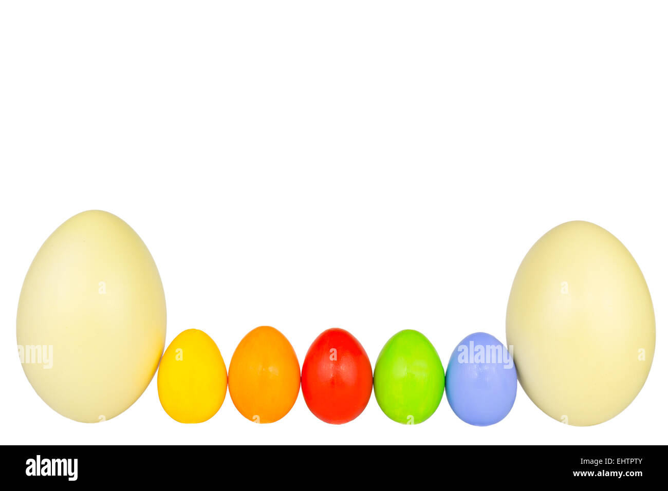 coloured easter eggs in a row 3 Stock Photo - Alamy