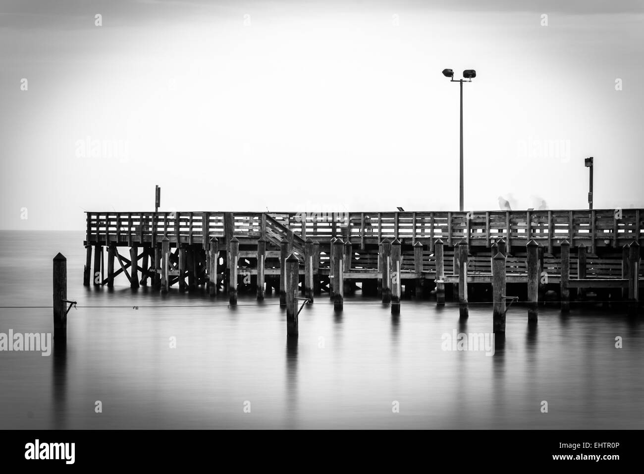 Long exposure of a pier in the Chesapeake Bay, in North Beach, Maryland ...