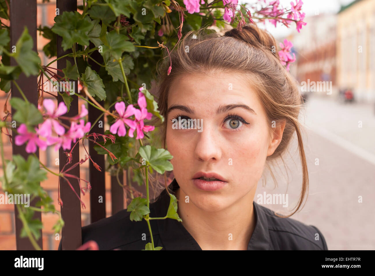 Young girl with expressive eyes, portrait outdoors Stock Photo - Alamy