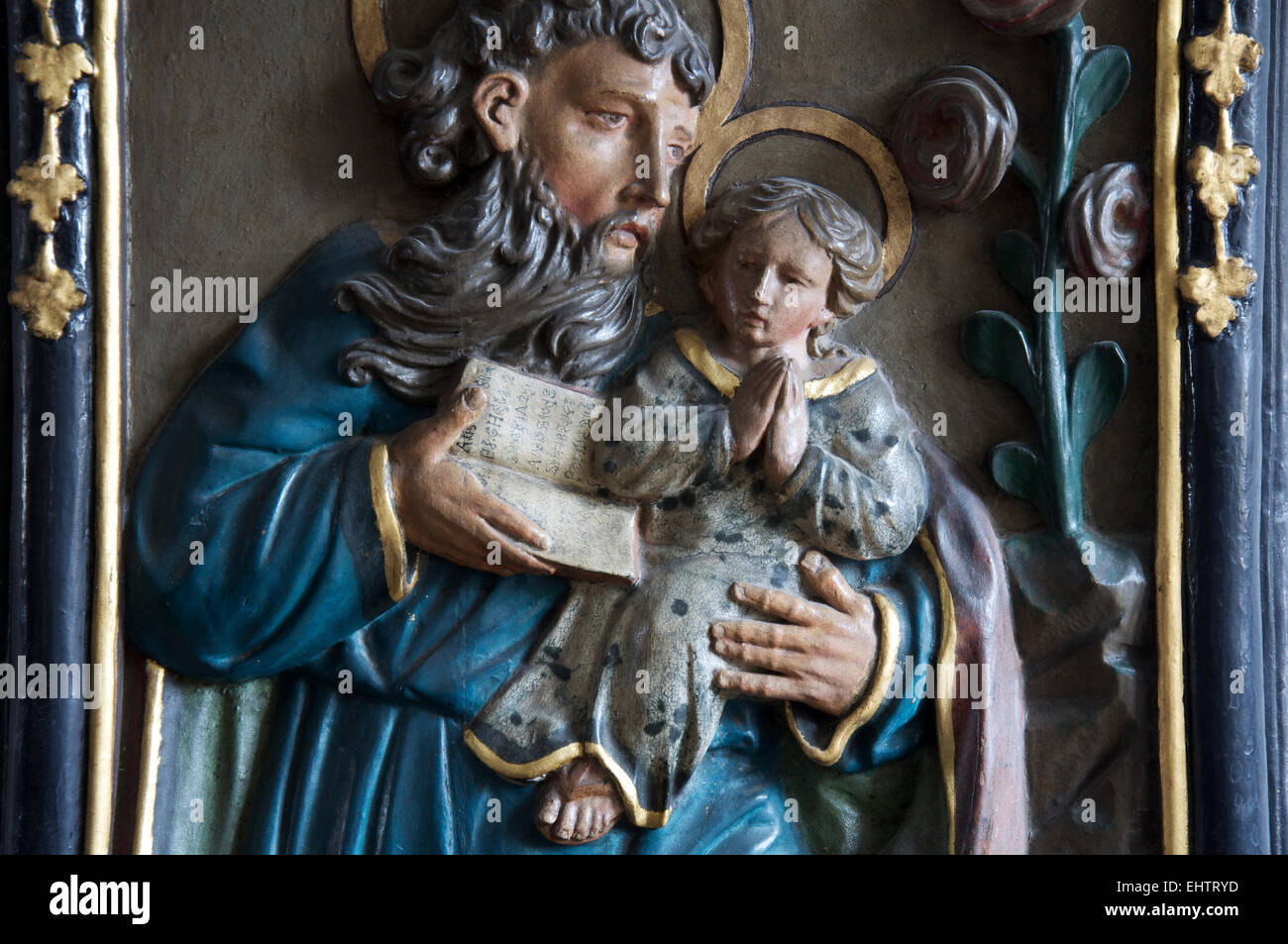Bible stories. Old Austrian wood carving of St Joseph teaching the ...