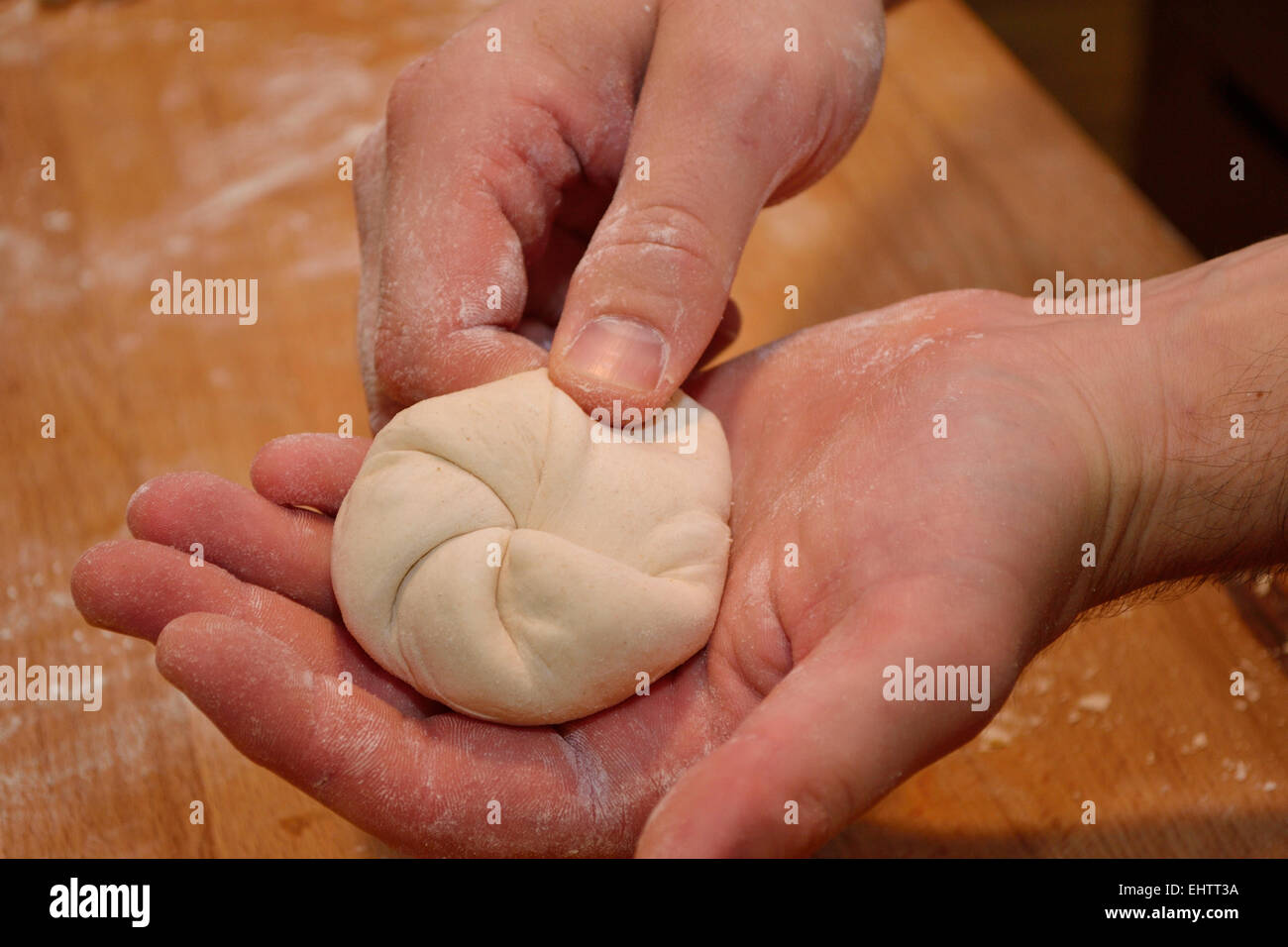 Bakers shaped hand roll Stock Photo - Alamy
