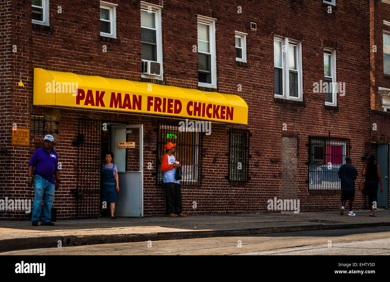 Pak Man Fried Chicken and people on the sidewalk, Baltimore, Maryland ...