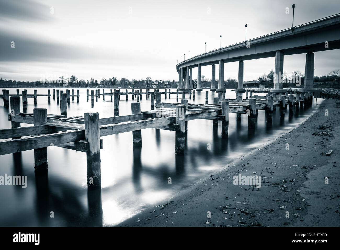 Pier posts in the Severn River and the Naval Academy Bridge, in ...