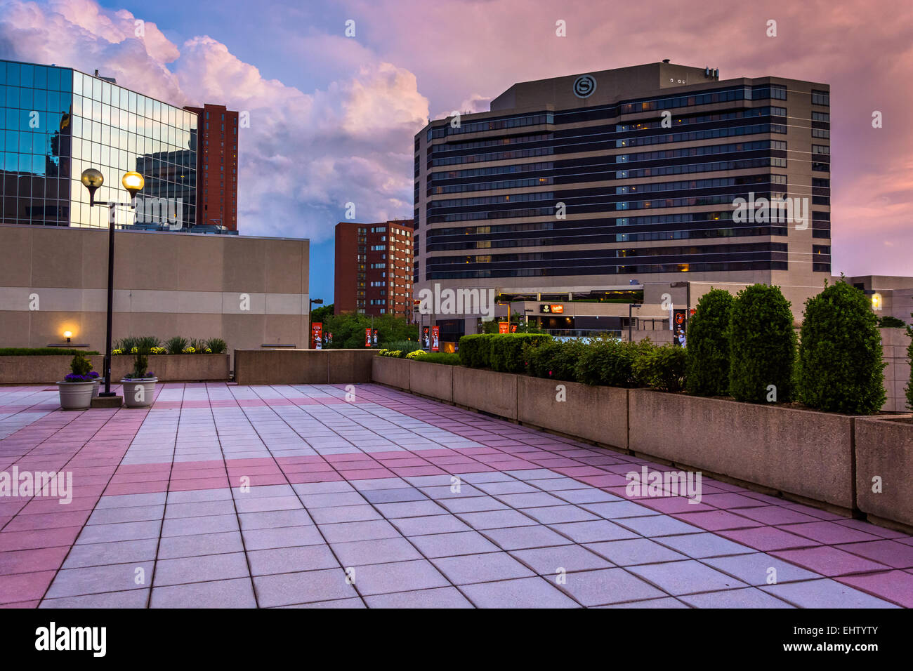 Plaza and modern buildings at sunset in downtown Baltimore, Maryland ...
