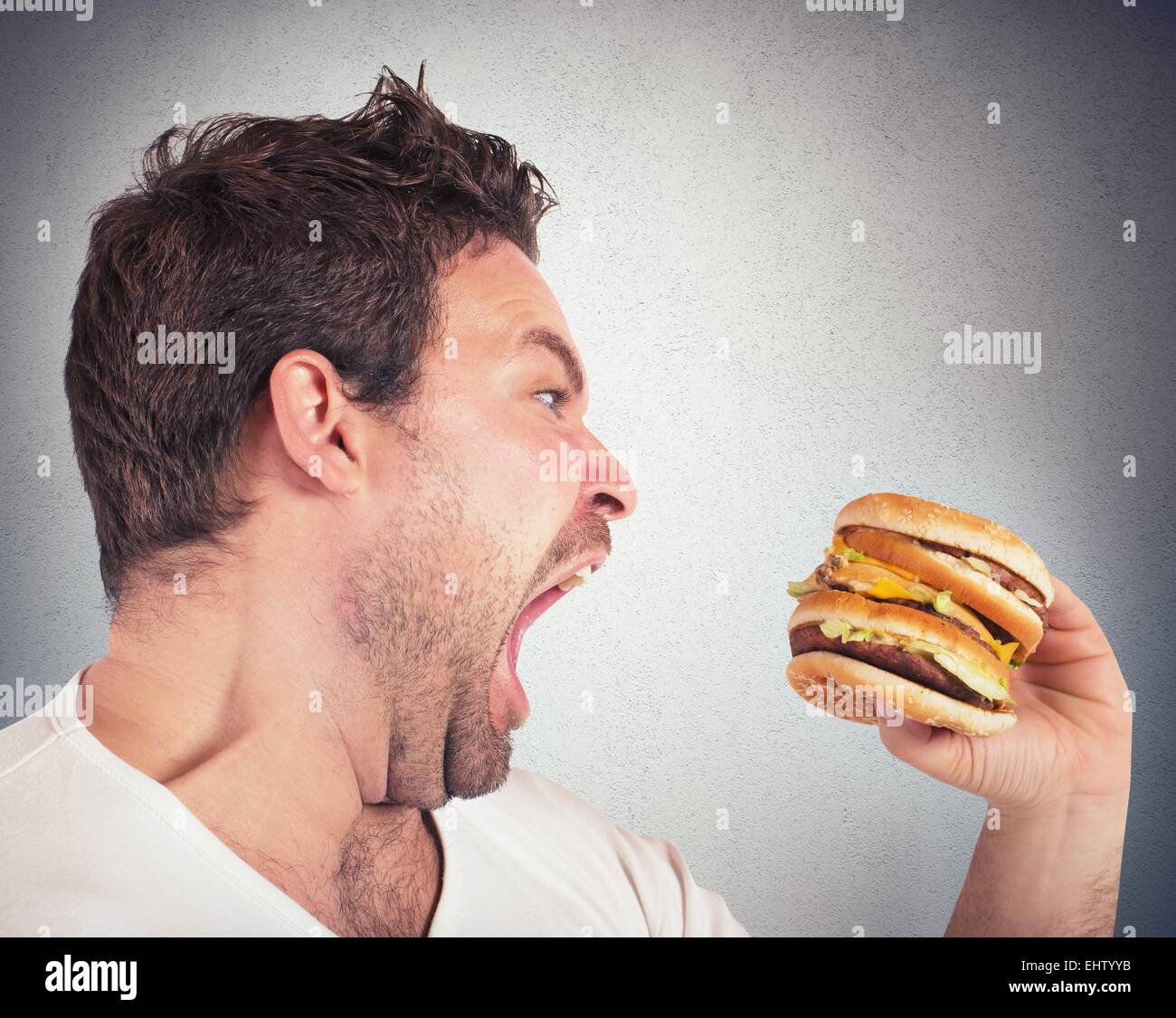 Fat man eating unhealthy hi-res stock photography and images - Alamy